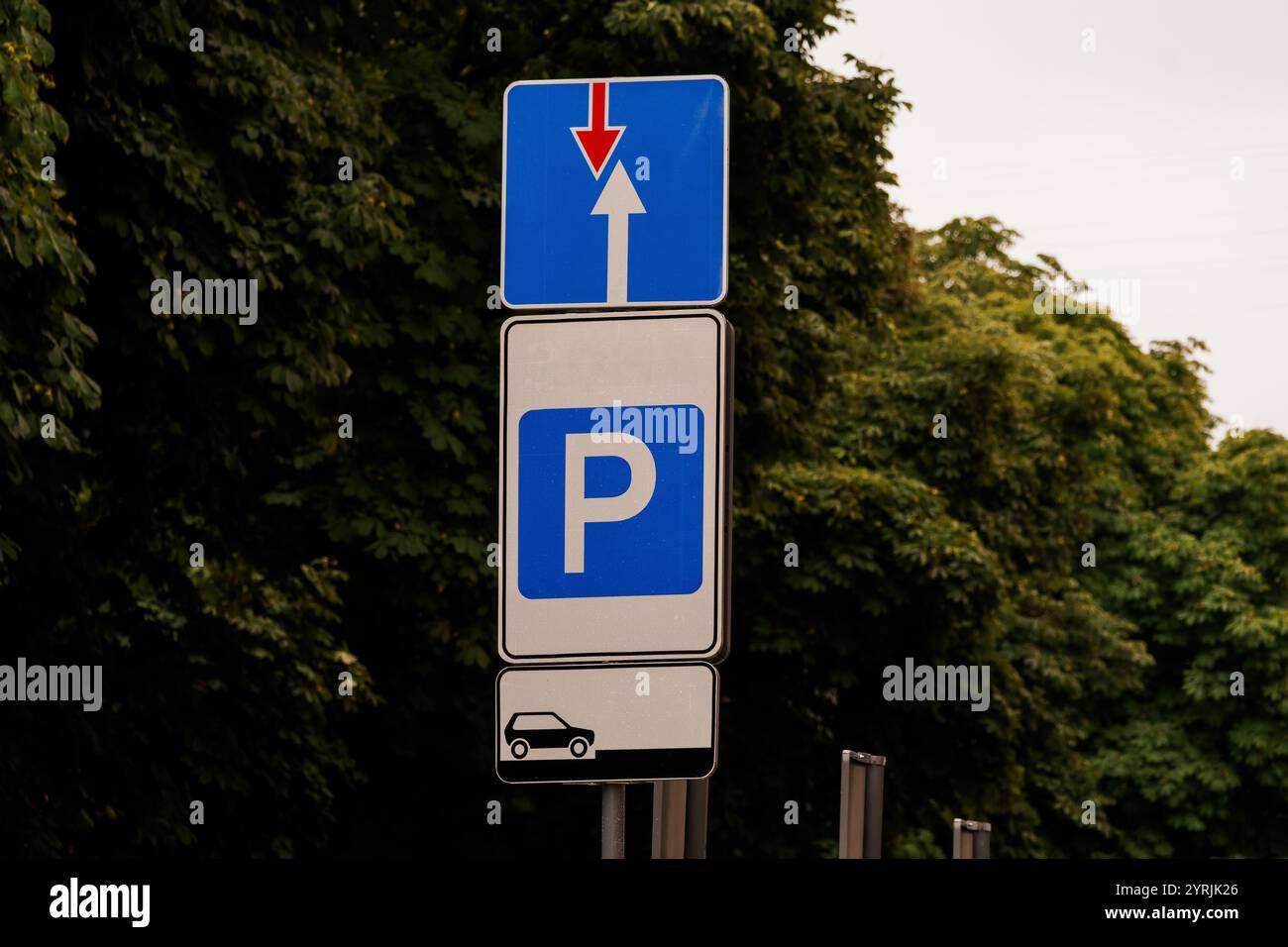 Traffic Sign Displaying Direction and Parking Information Stock Photo ...