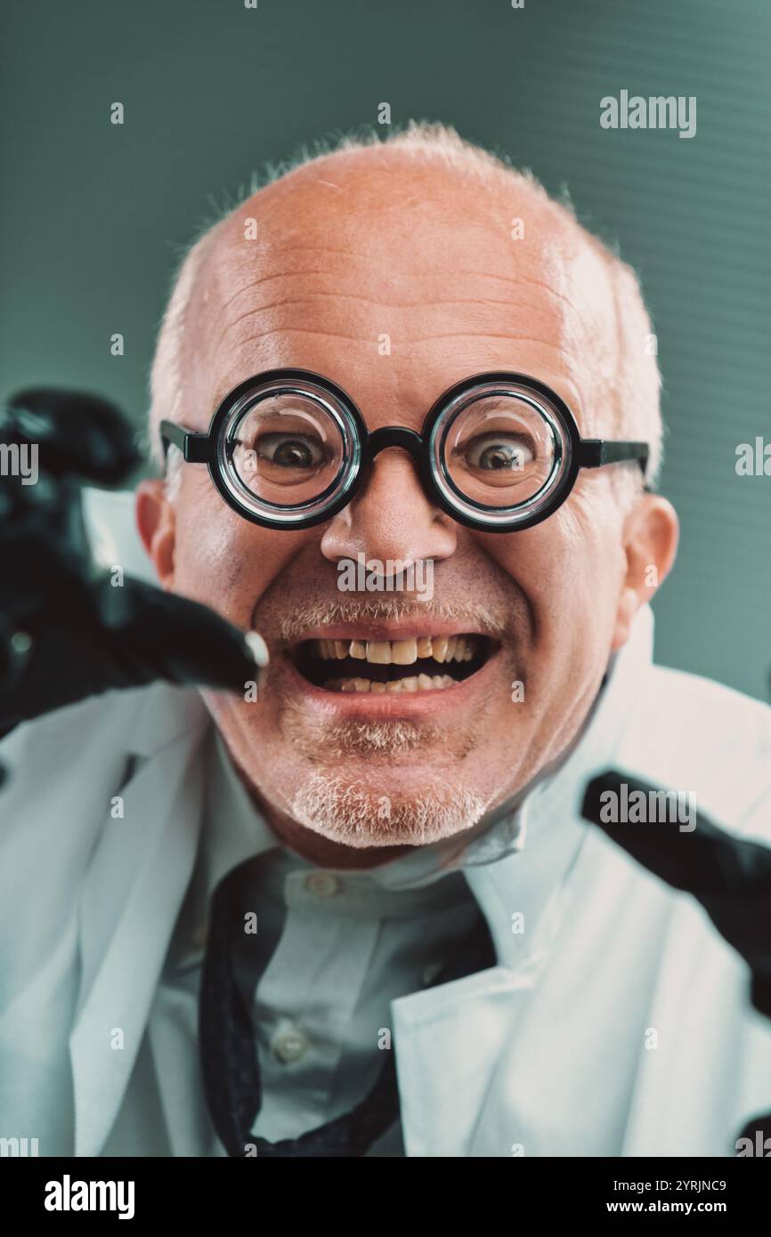 Mad scientist wearing thick glasses and black gloves conducts a bizarre ...