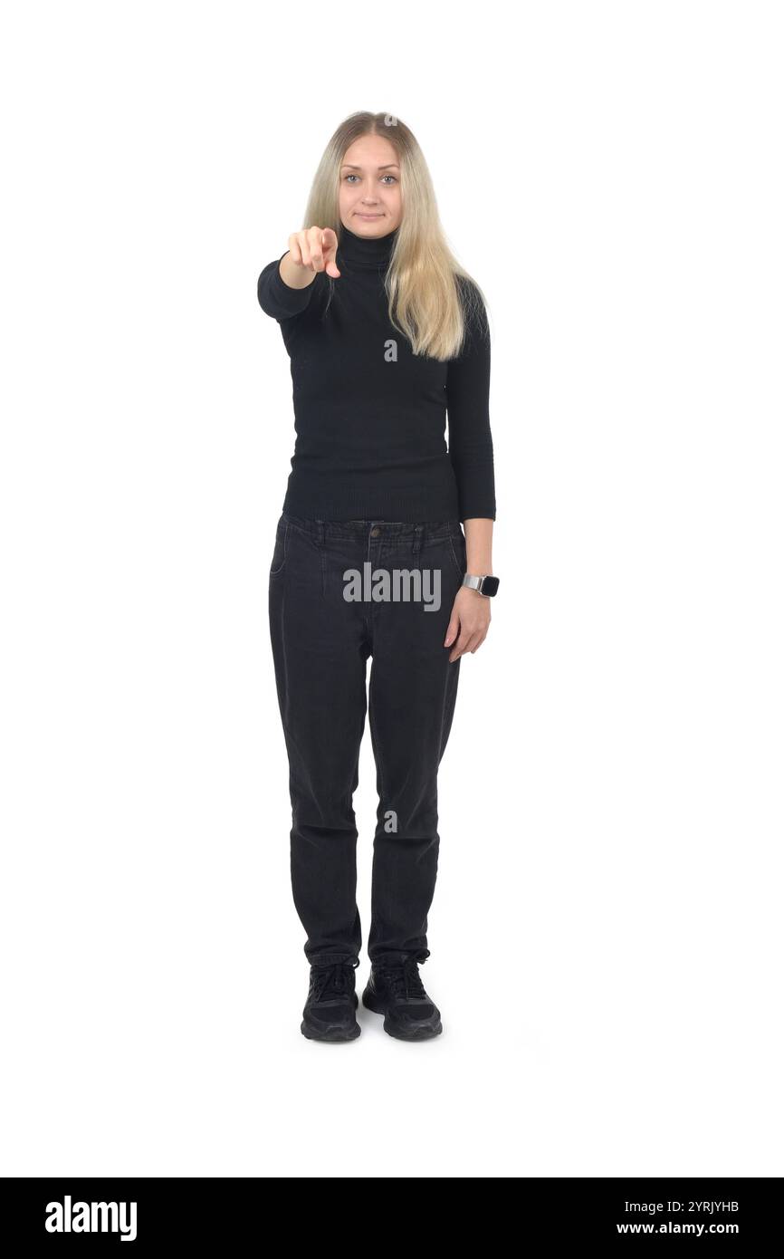 front view of a blonde woman pointing finger front on white background ...