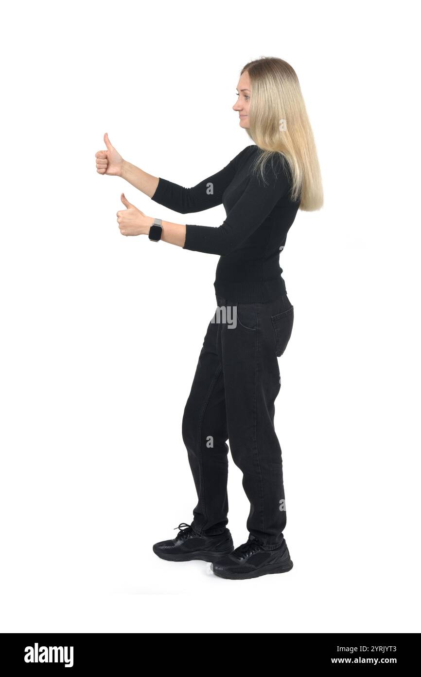 side view of a woman showing thumbs up on white background Stock Photo ...