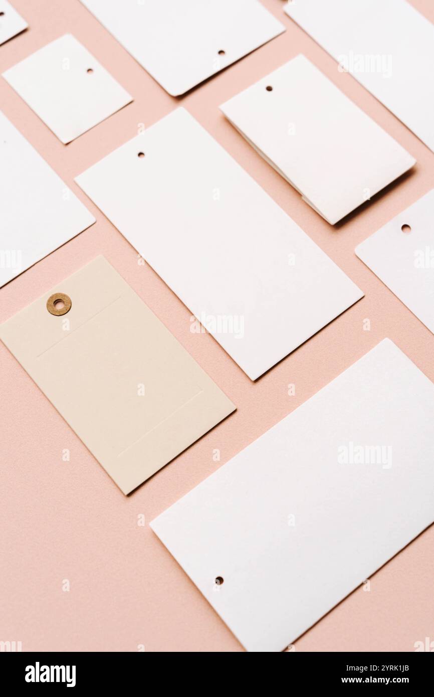 White price labels, blank tags with different shapes and sizes on a ...