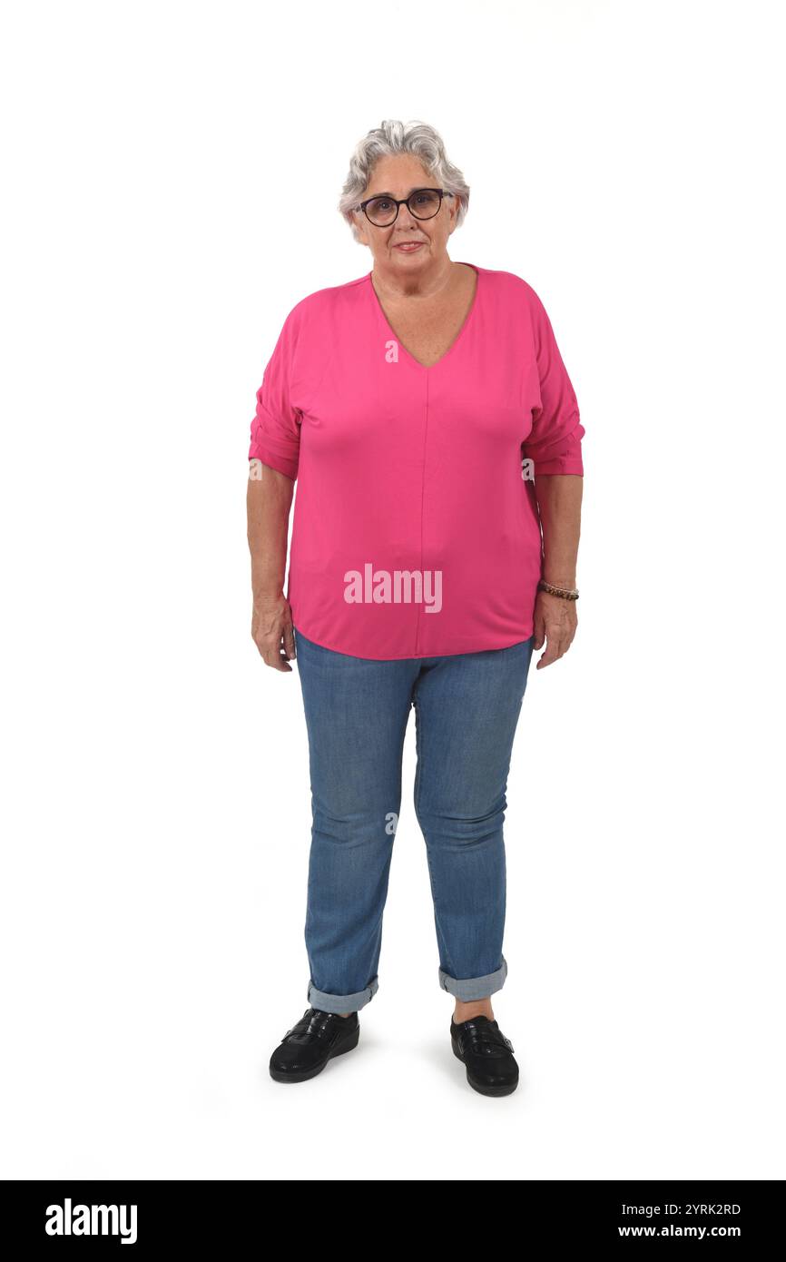 front view portrait of standing senior woman on white background Stock ...