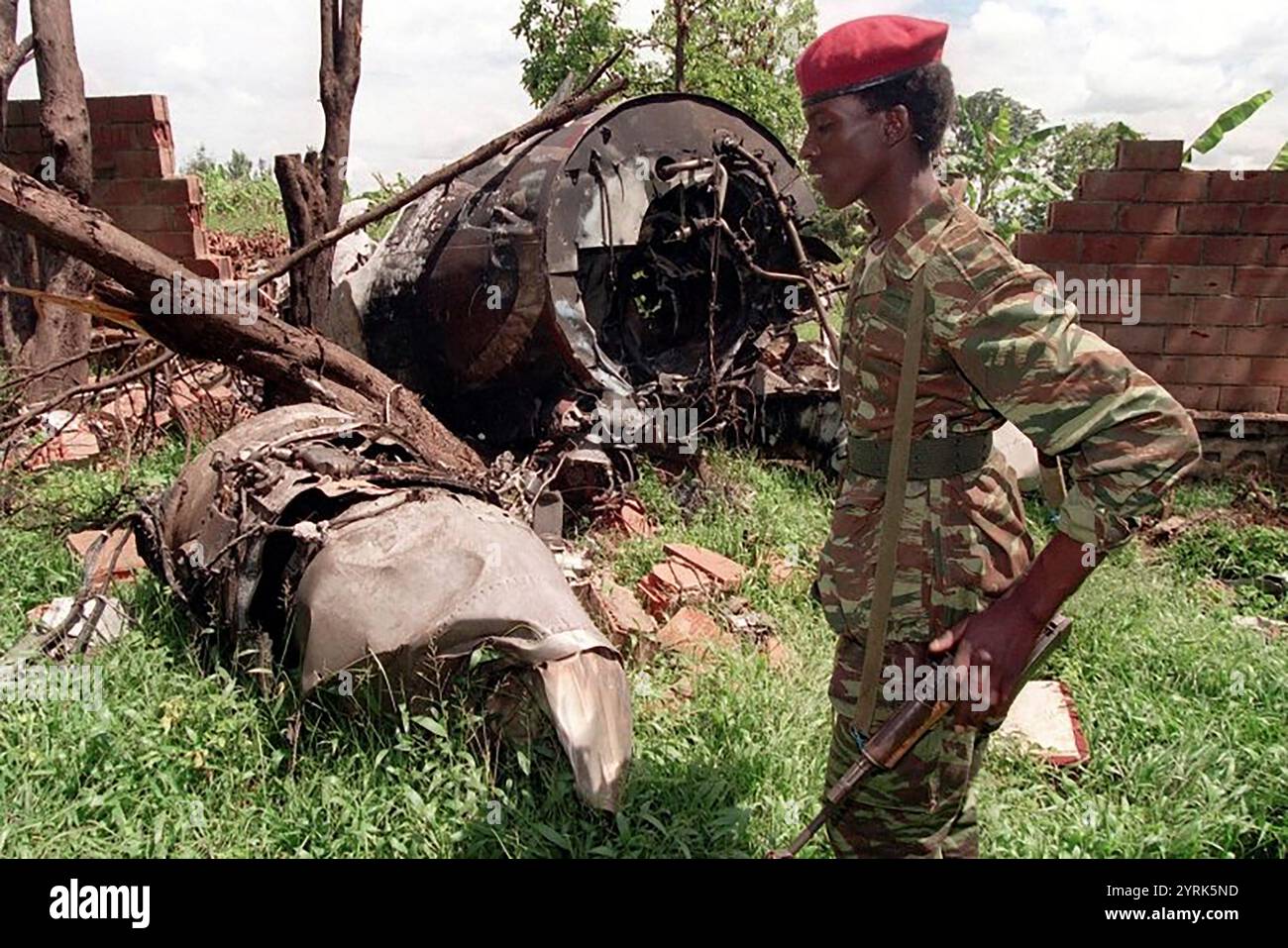Wreckage of the Presidential aircraft in the grounds of the Rwandan Presidential Palace. 1994 ...