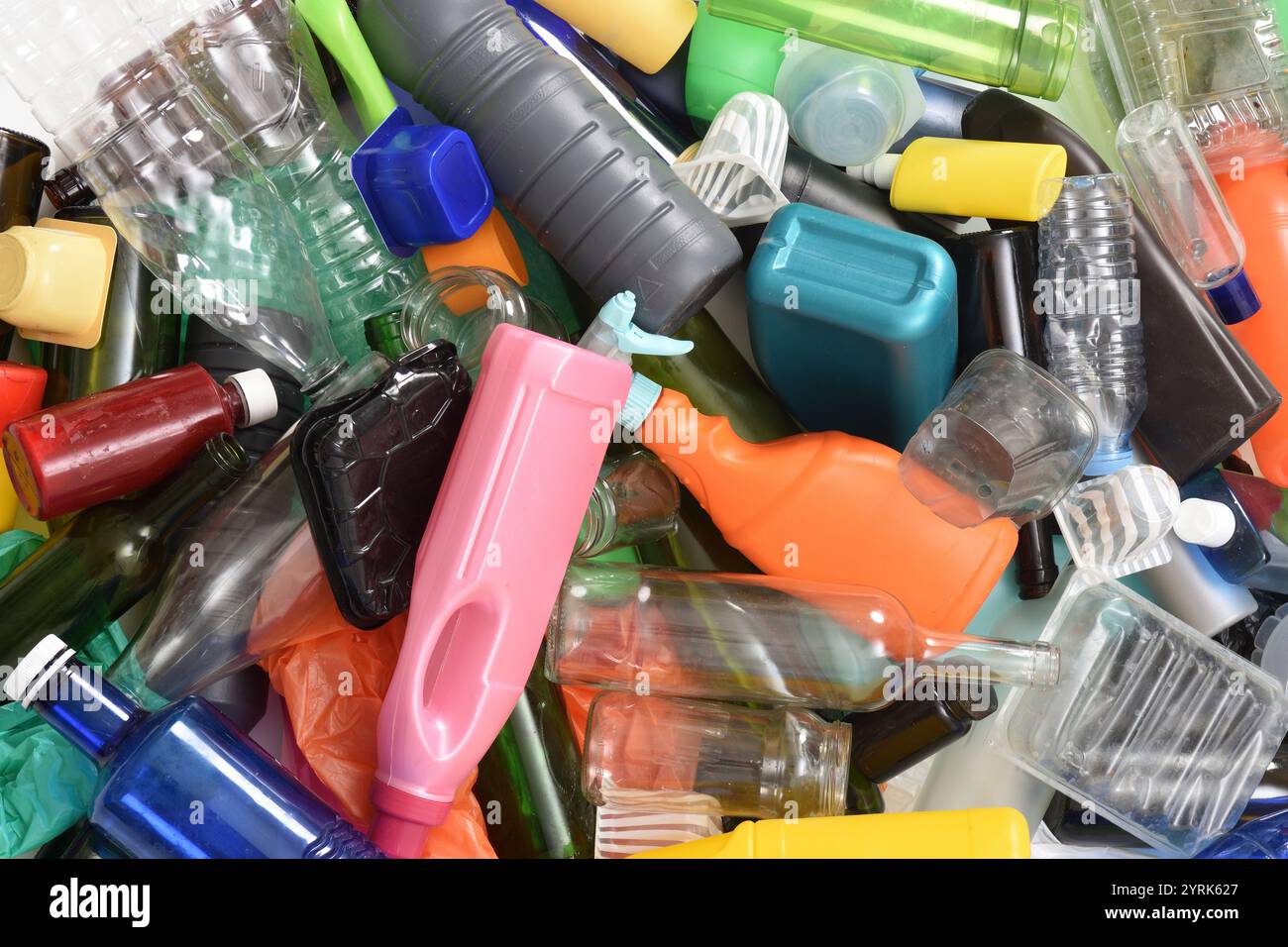 close up of a garbage, group of plastic and glass containers isolated ...