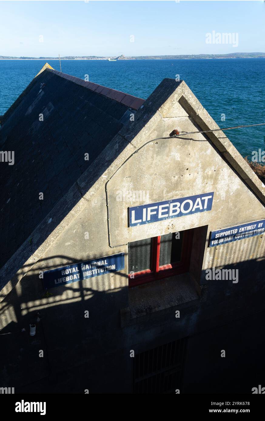 Penlee Lifeboat house on the Cornish (UK) coast with St Michaels Mount ...