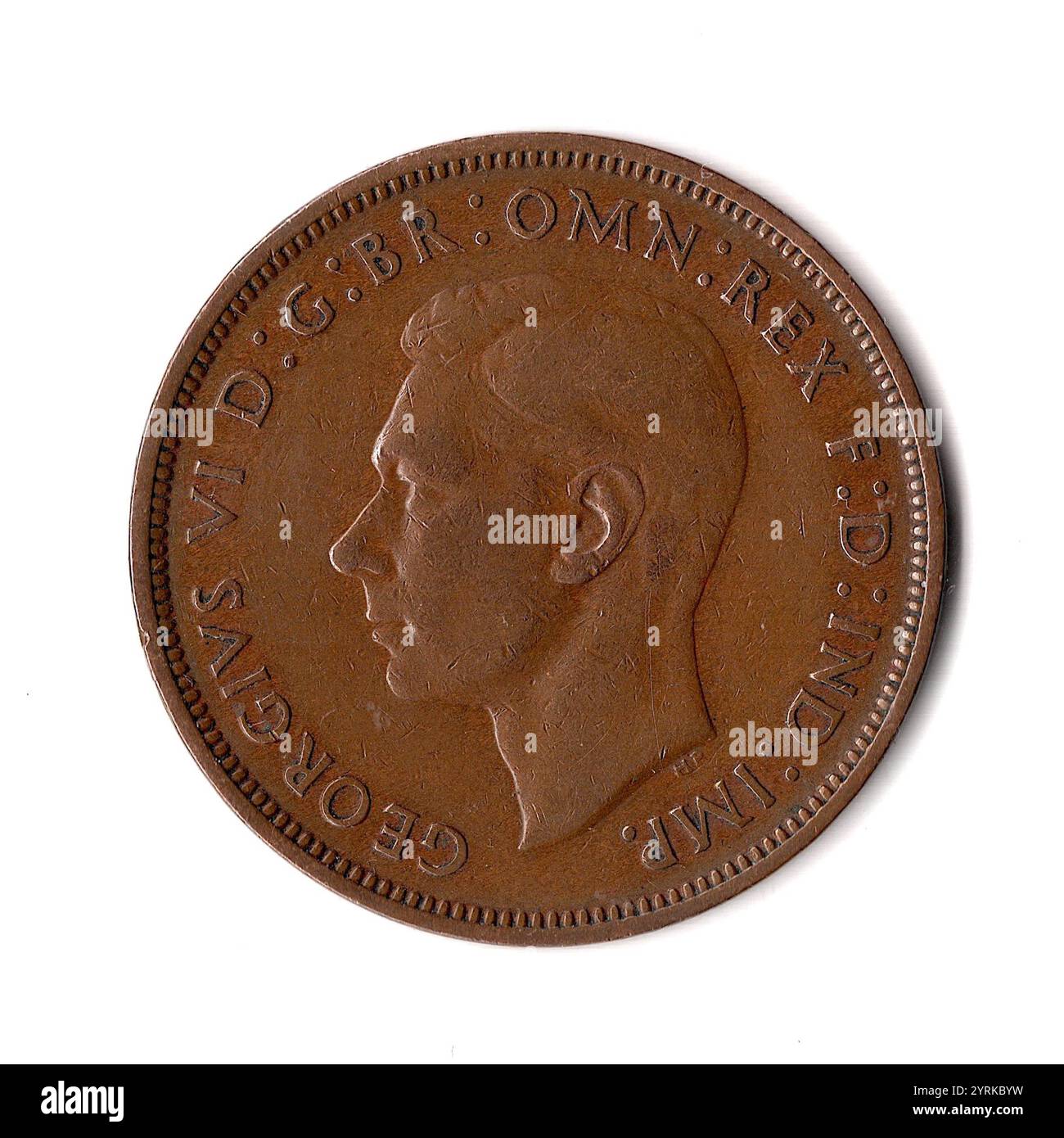 The front of a King George VI penny from Great Britain on a white ...