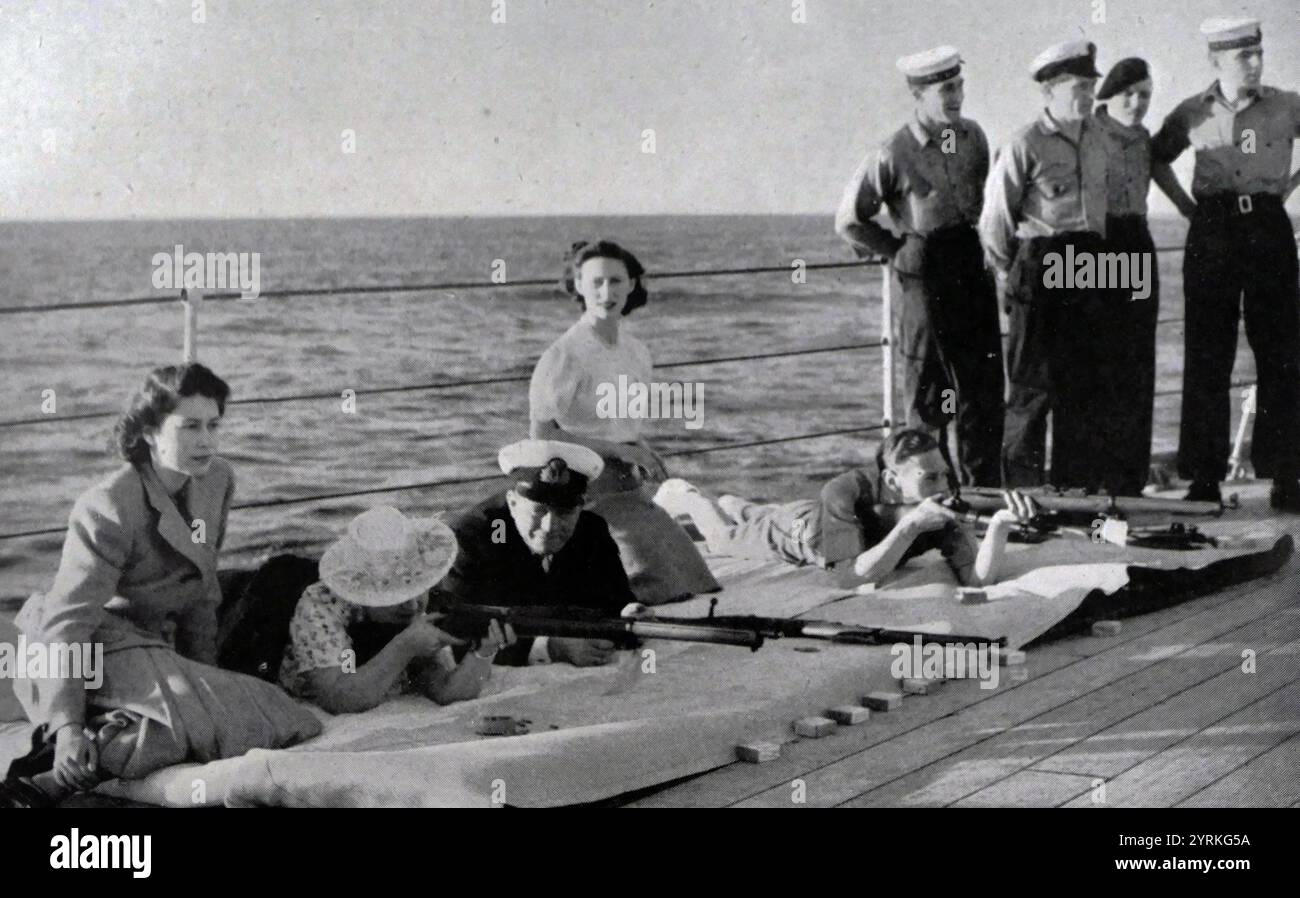 King George VI of England with Queen Elizabeth, Princess Margaret and ...