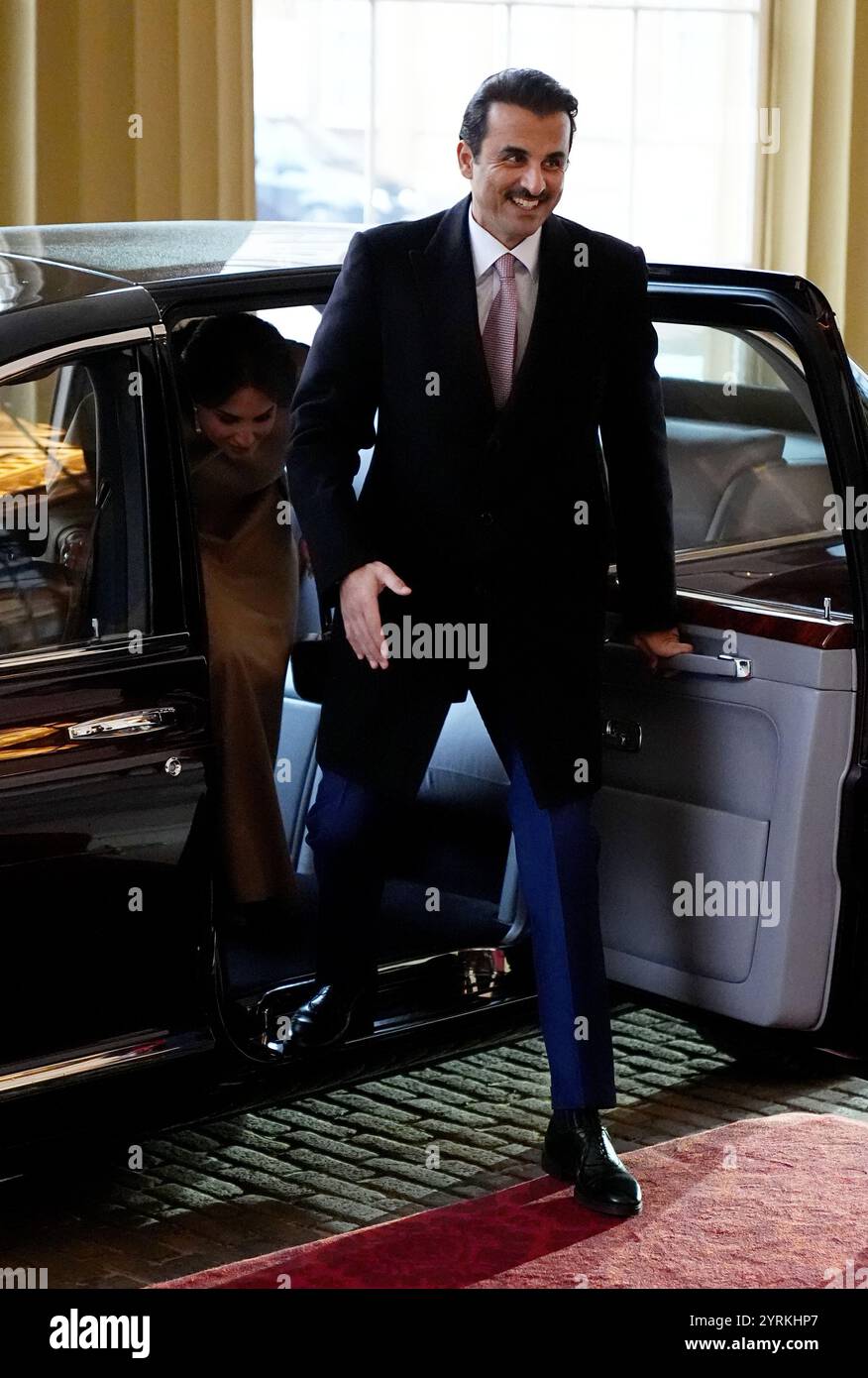 The Emir of Qatar Sheikh Tamim bin Hamad Al Thani and his wife Sheikha Jawaher arrive at ...