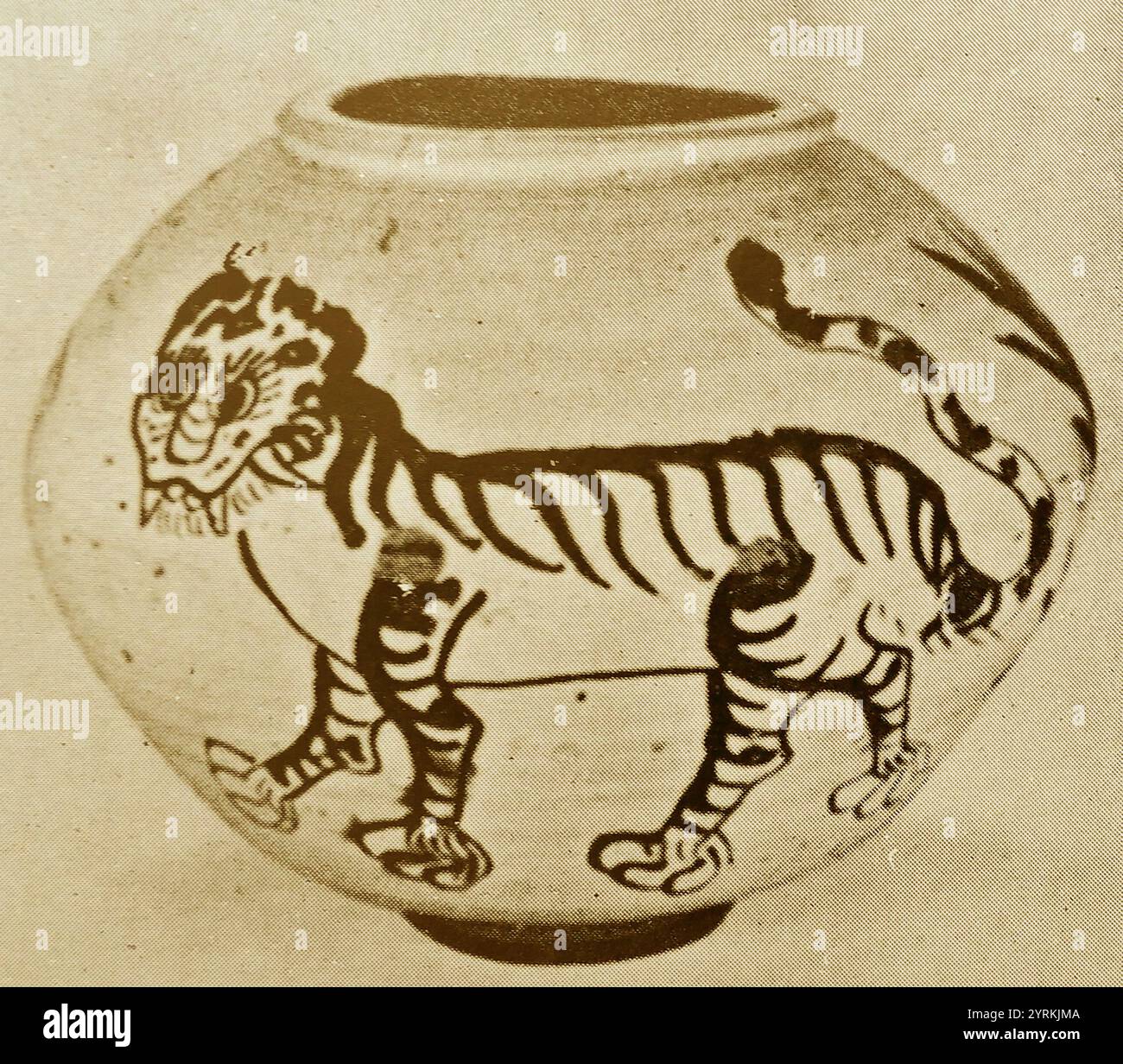 A Korean Jar from Joseon Dynasty. Painted in underglaze iron brown ...
