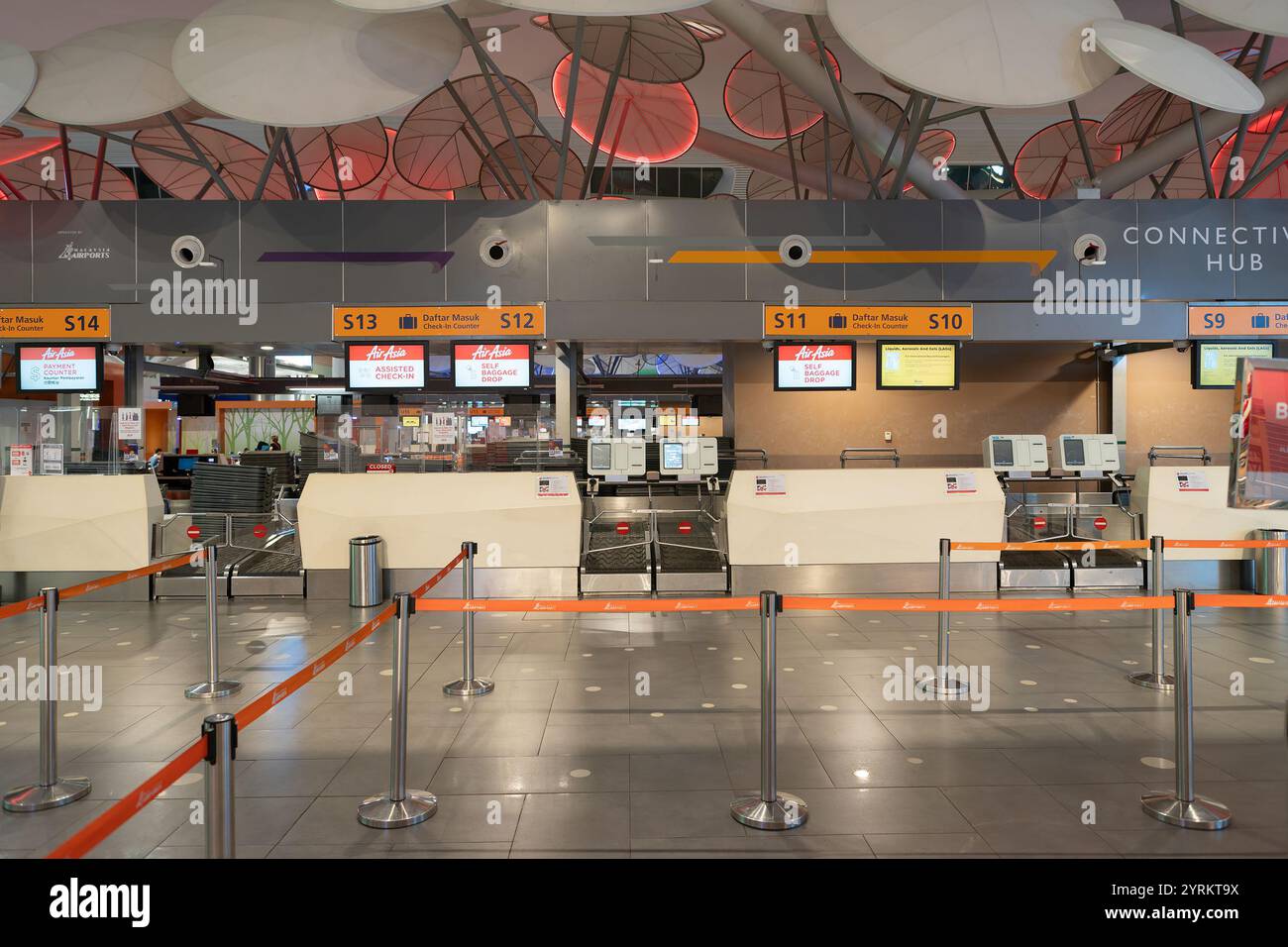 KUALA LUMPUR, MALAYSIA - NOVEMBER 14, 2023: check-in counters at KLIA2 ...