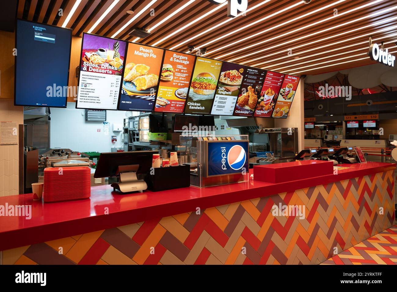 KUALA LUMPUR, MALAYSIA - NOVEMBER 14, 2023: service counter in Jollibee ...