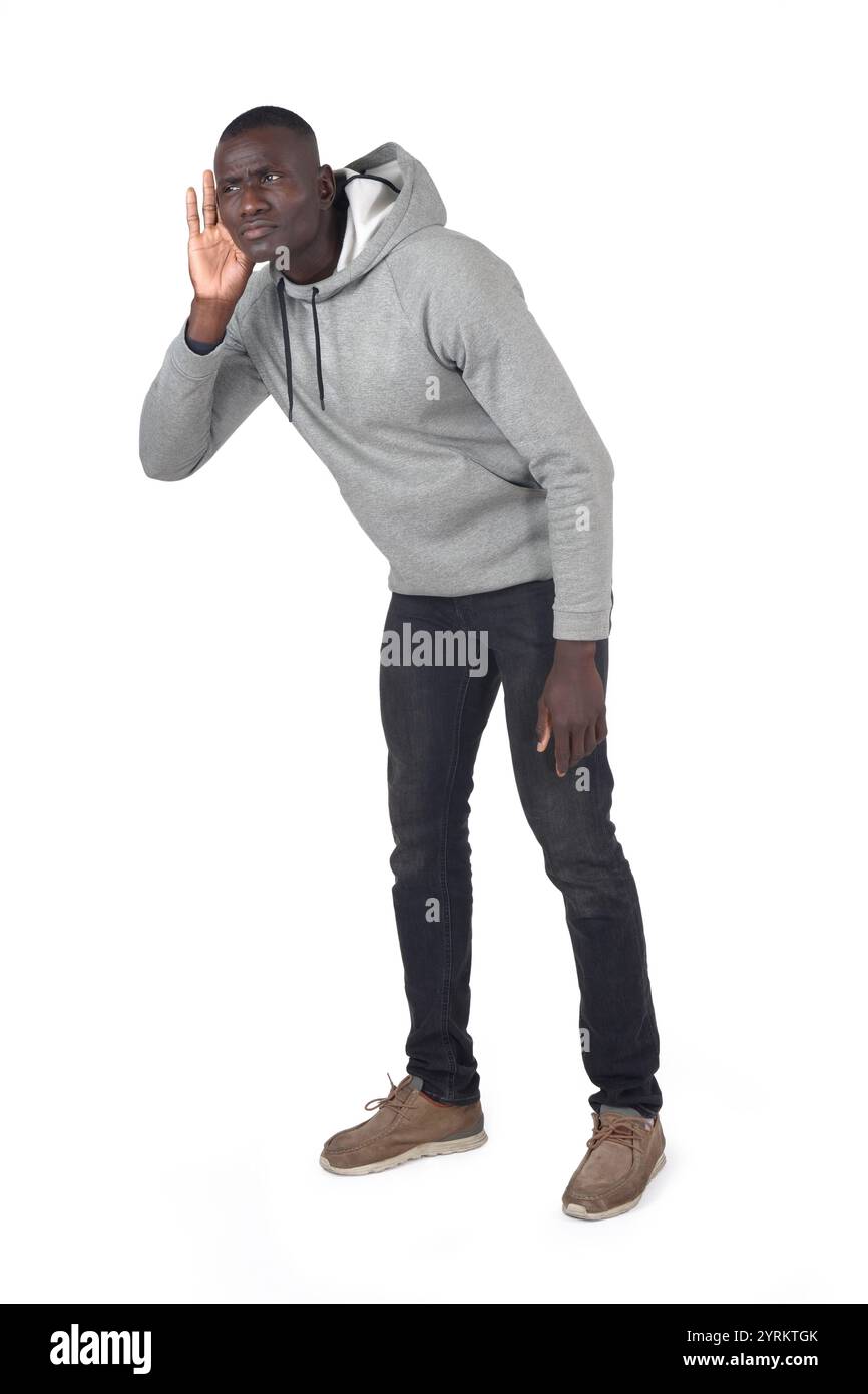 man with hand on ear who is listening on white background Stock Photo ...