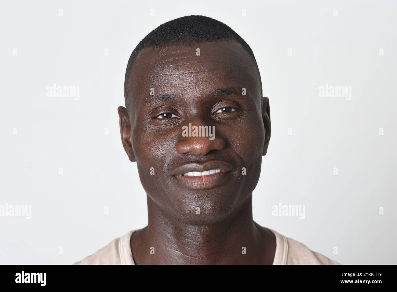 front face portrait of a man looking at camera on white background ...