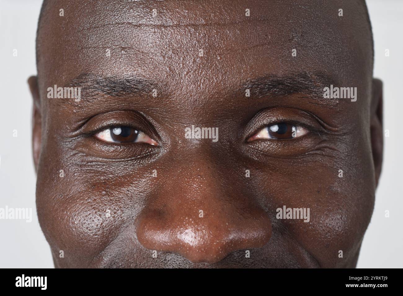 front view of a detail of a man's eyes looking into camera Stock Photo ...
