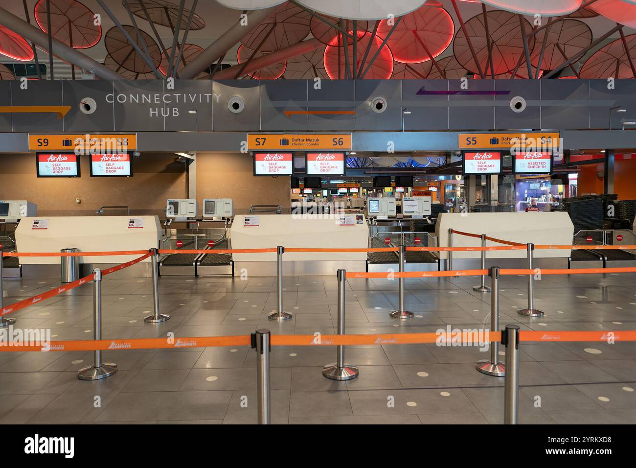 KUALA LUMPUR, MALAYSIA - NOVEMBER 15, 2023: check-in counters at KLIA2 ...