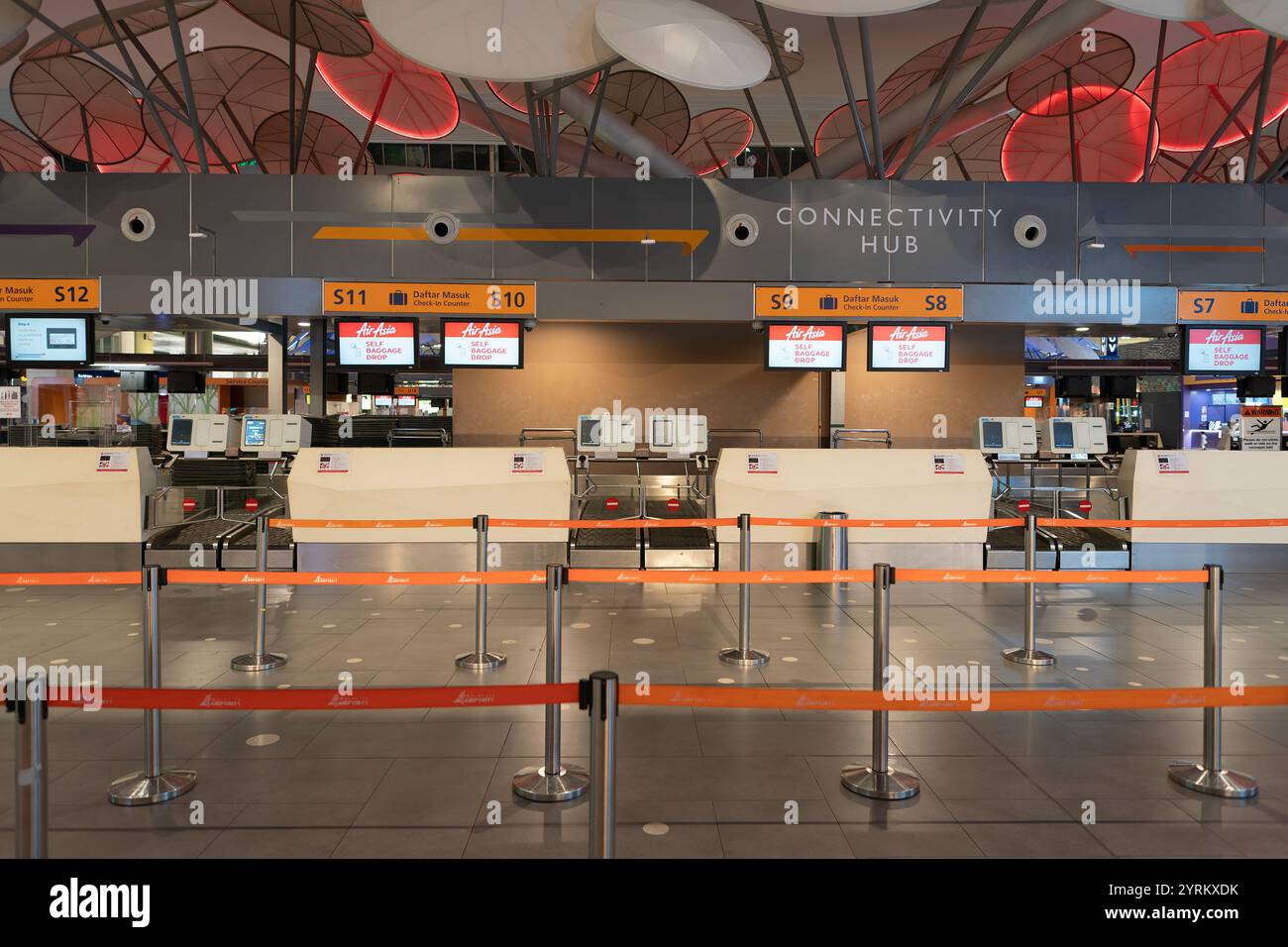KUALA LUMPUR, MALAYSIA - NOVEMBER 15, 2023: check-in counters at KLIA2 ...