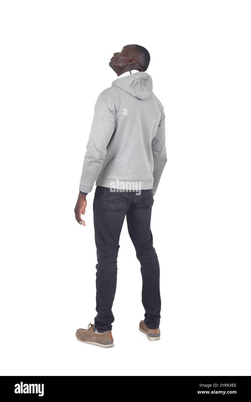 side back view of a man standing and look up on white background Stock ...
