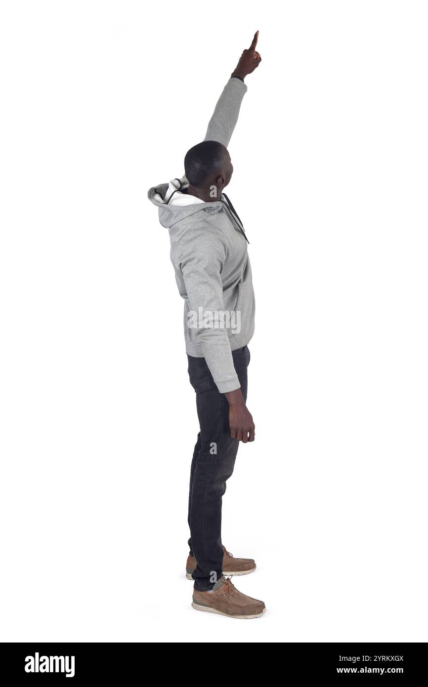 side view of a man pointing up on white background Stock Photo - Alamy