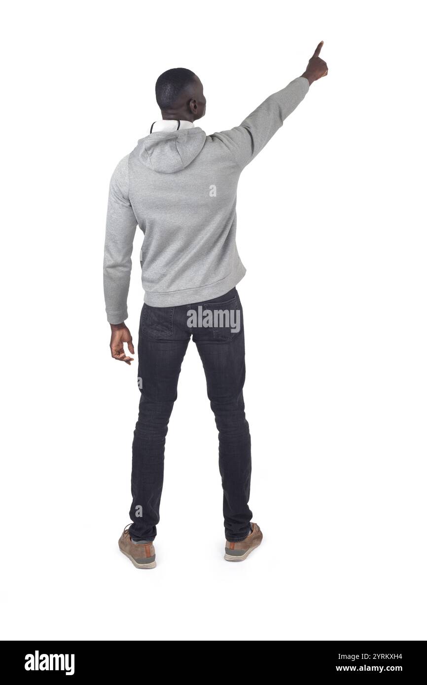 back view of a man pointing up on white background Stock Photo - Alamy