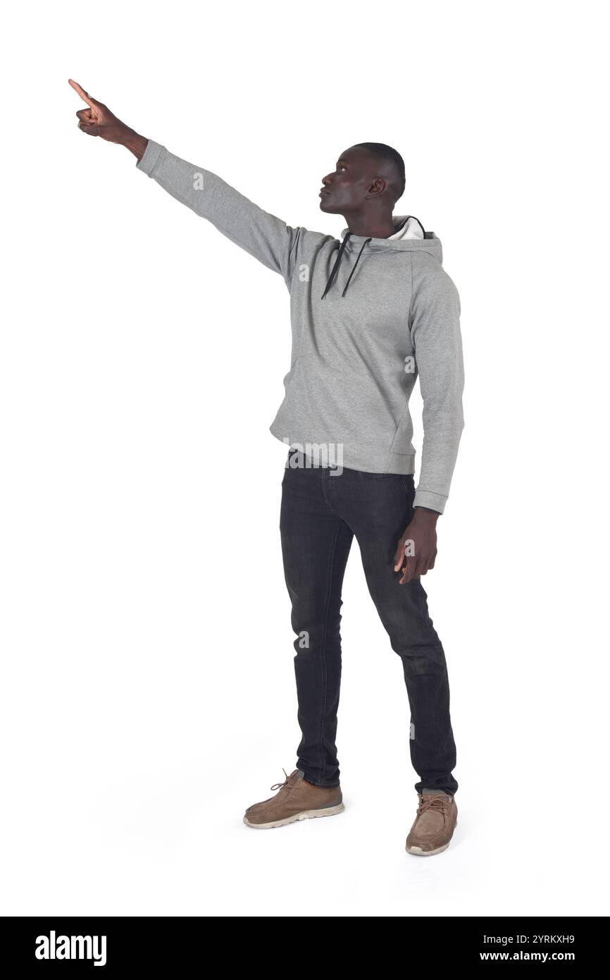 side view of a man pointing up on white background Stock Photo - Alamy