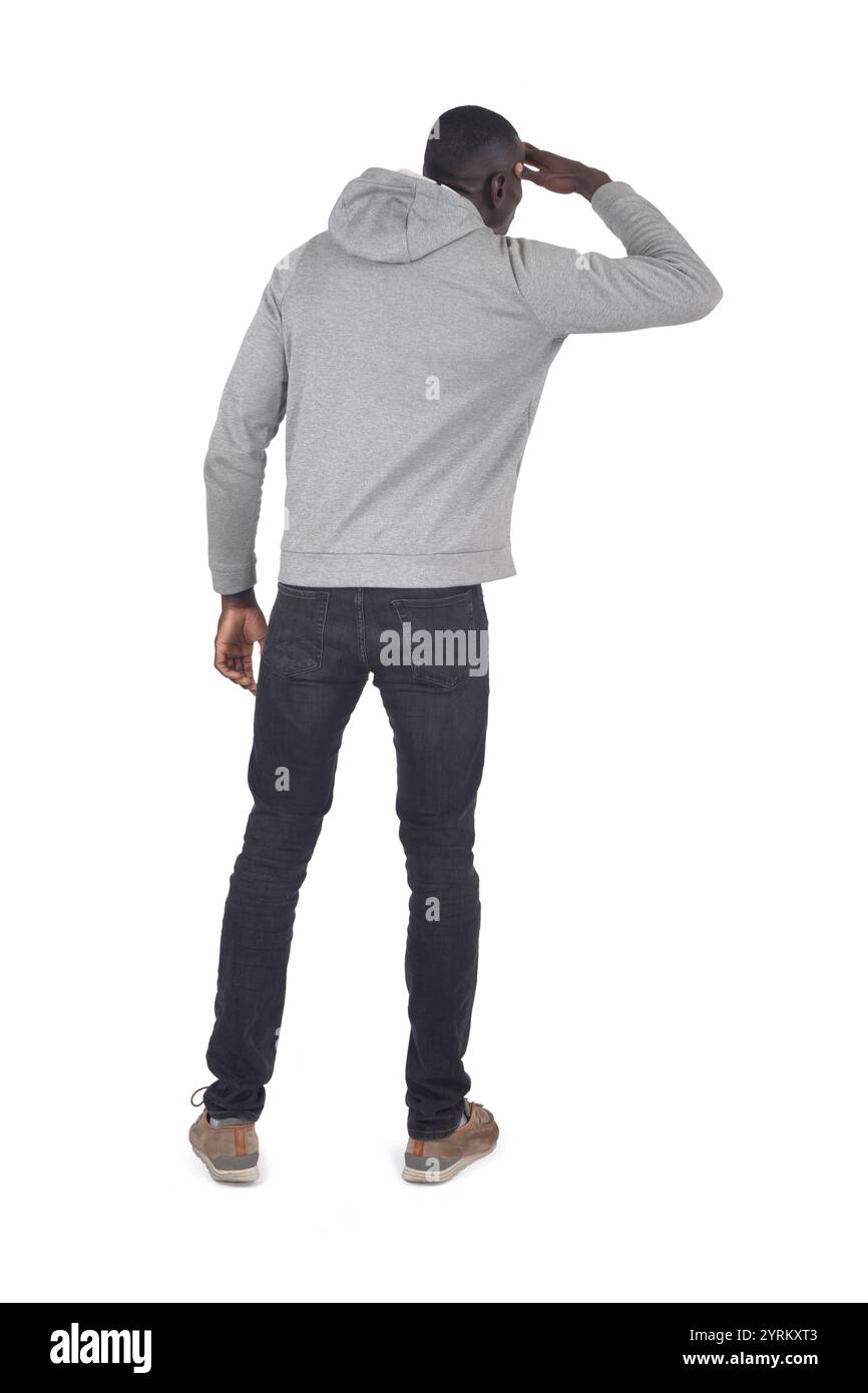 back view of a a man hand on forehead looking away on white background ...