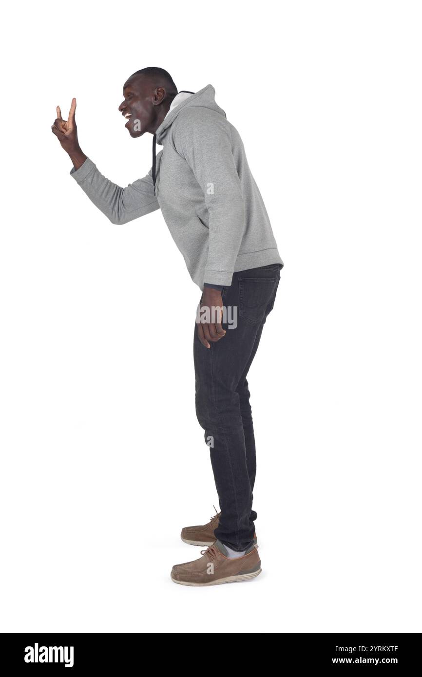 view of a man showing the horns sign with fingers on white background ...