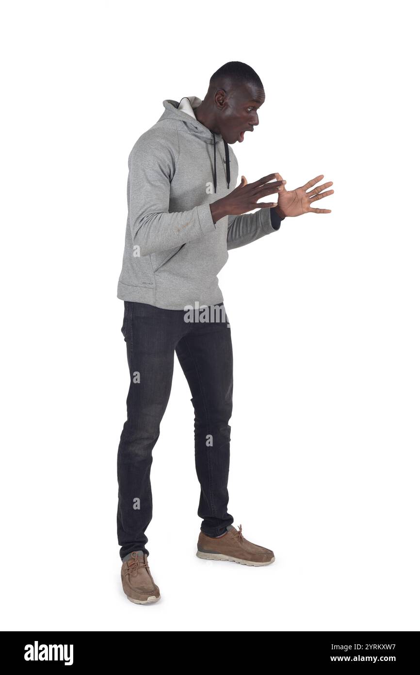 side view of a man showing a surprised attitude look down on white ...