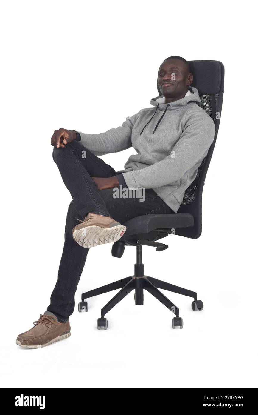 side view a man sitting on chair on white background Stock Photo - Alamy