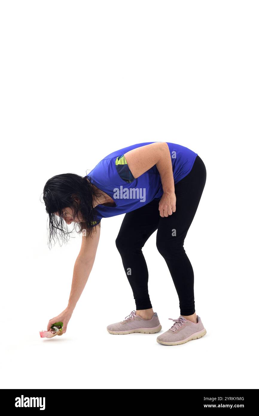 woman picking up a paper from the floor on white background Stock Photo ...