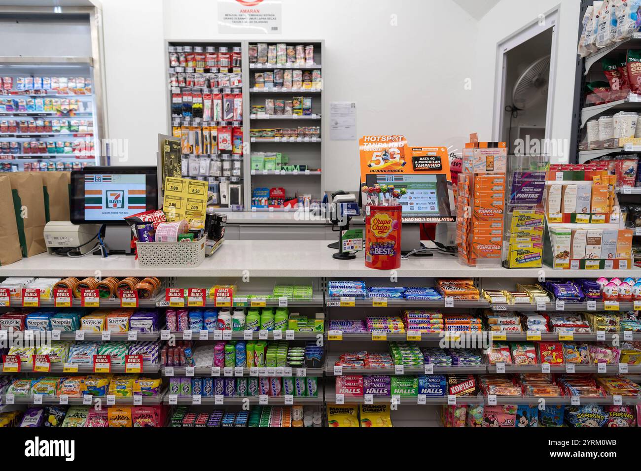 KOTA BHARU, MALAYSIA - NOVEMBER 16, 2023: cash register area at 7 ...