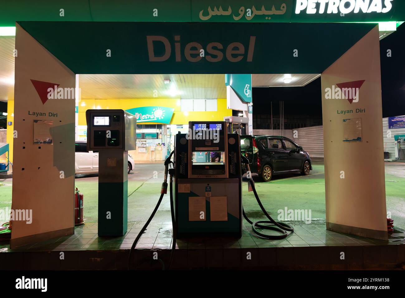KOTA BHARU, MALAYSIA - NOVEMBER 17, 2023: street level view of a Petronas gas station in Kota ...
