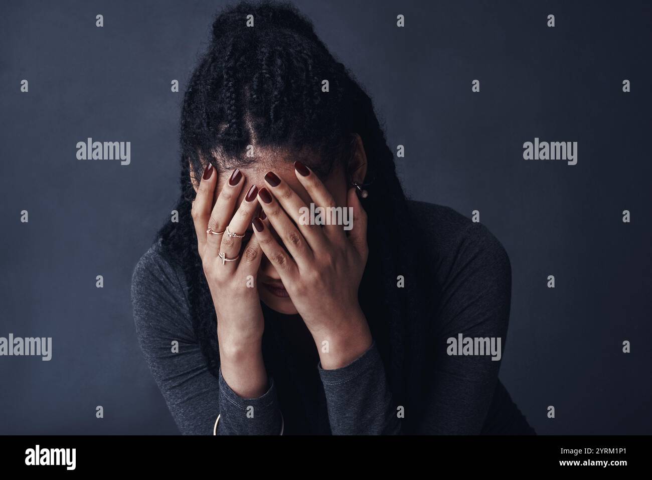 Sad, depression and woman in studio crying for bad news, heartbreak and ...