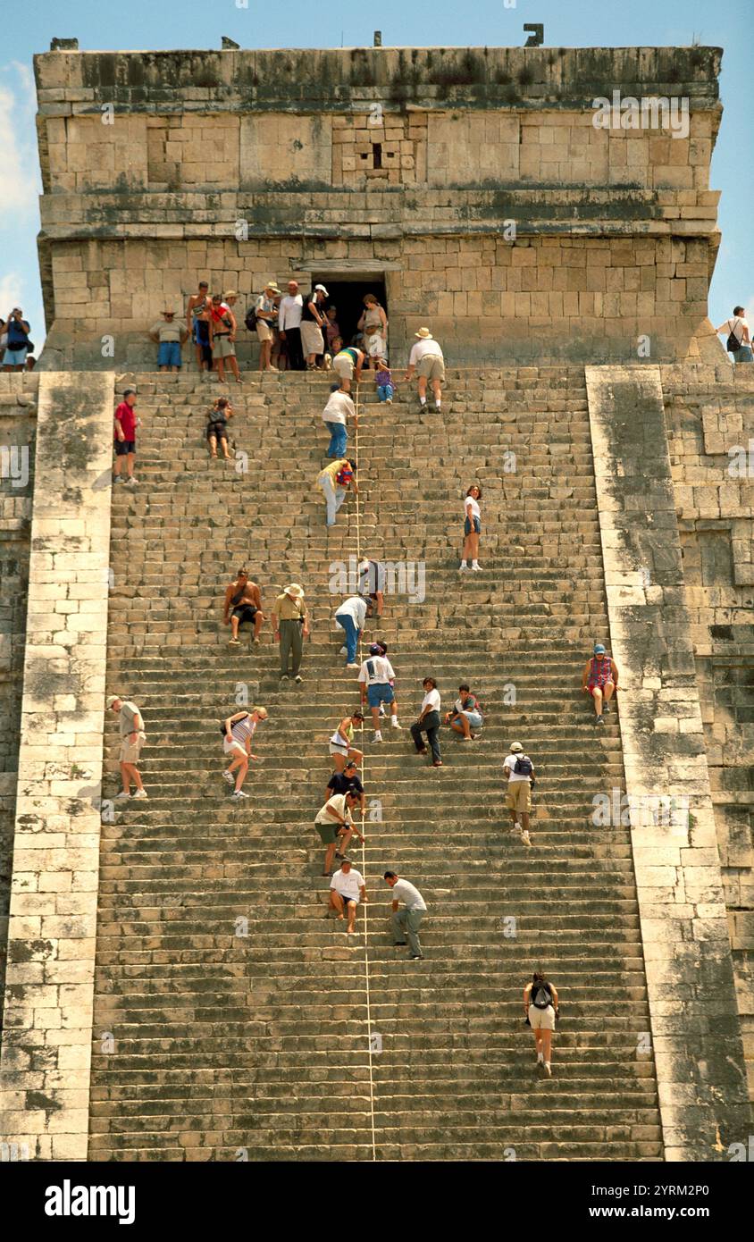 Tourists climbing The Castle (Pyramid of Kukulcan). Chichén Itzá ...