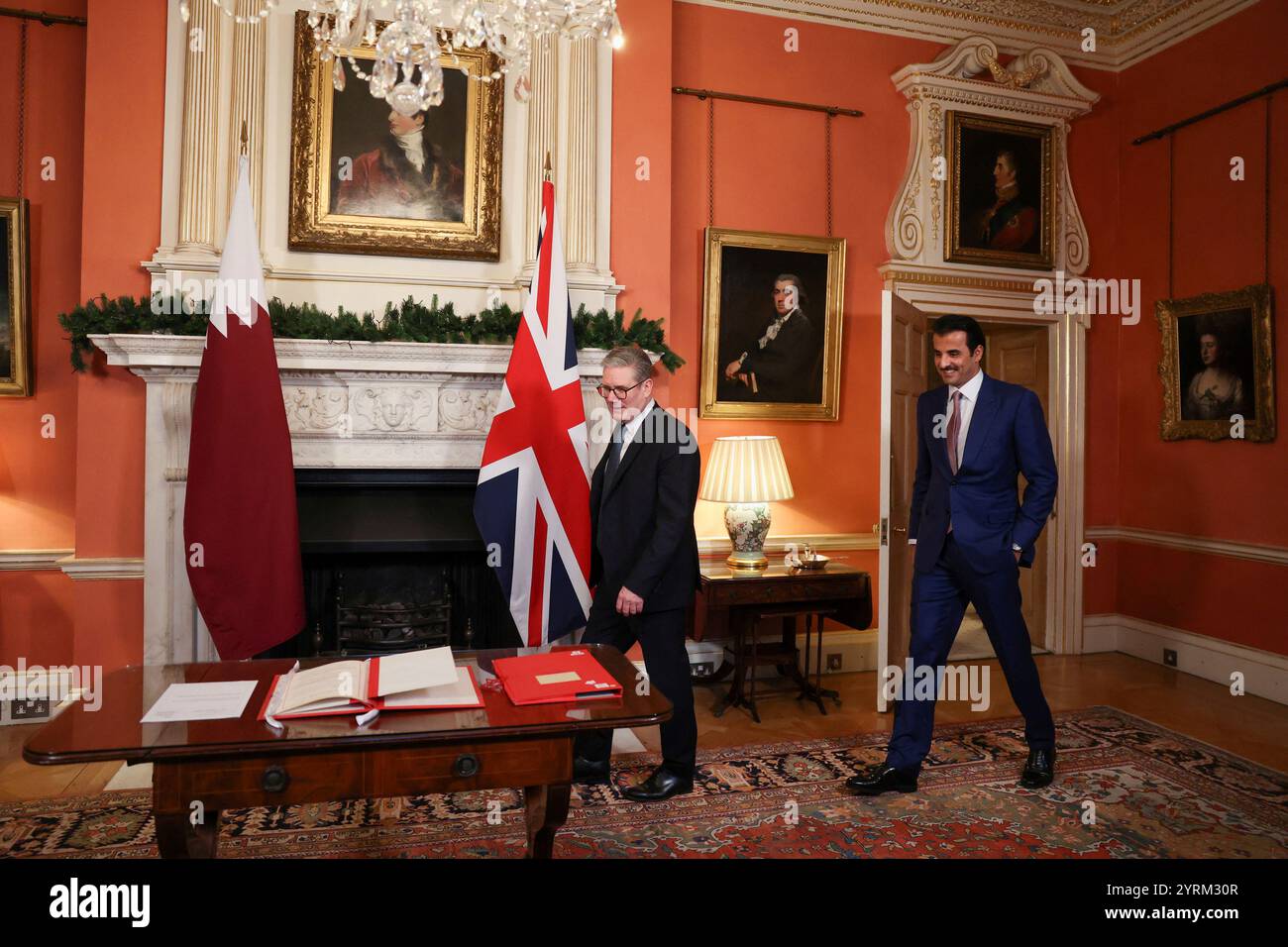 British Prime Minister Keir Starmer, left, meets Qatar's Emir Sheikh ...