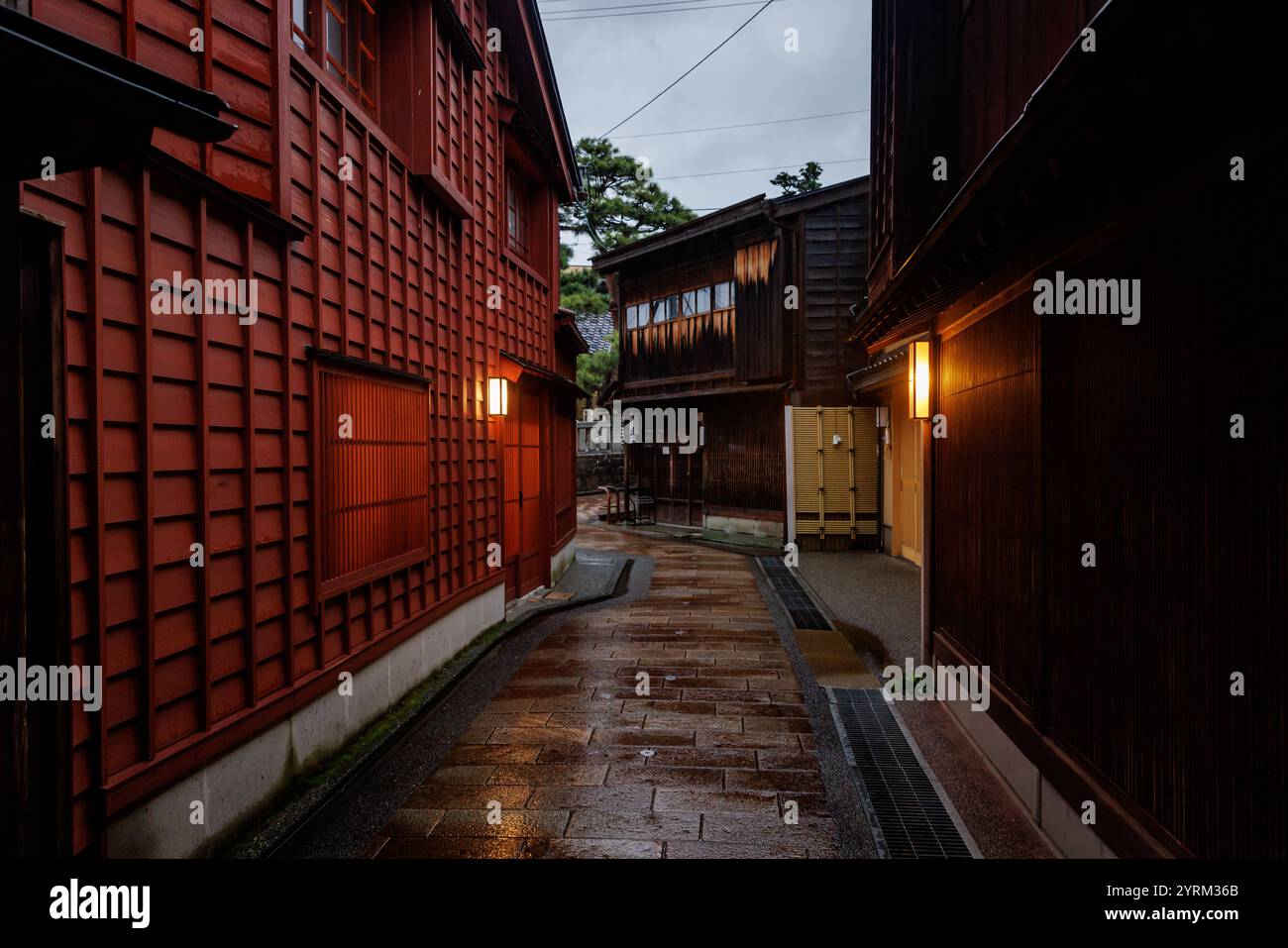A beautiful and charming rainy alleyway featuring traditional Japanese ...