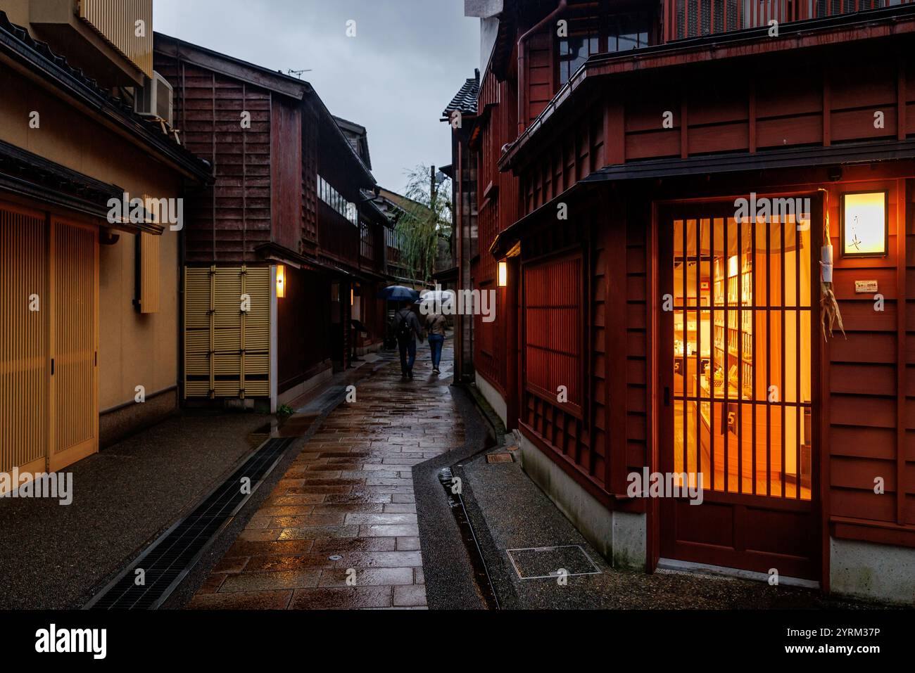 A calm, rainy evening in a quaint Japanese alley features beautiful ...