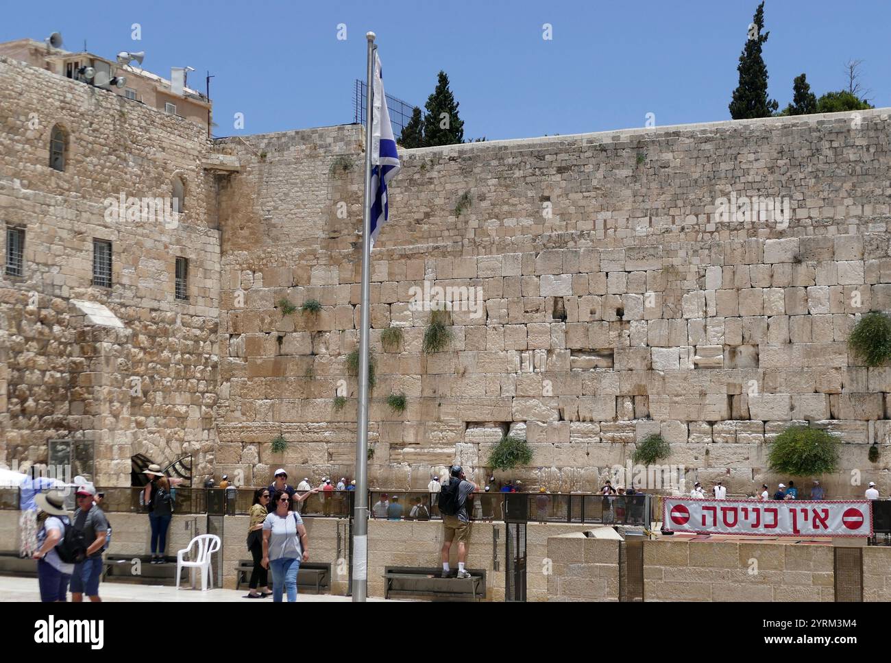Jews pray at the Western Wall, (Wailing Wall, or Kotel), an ancient ...