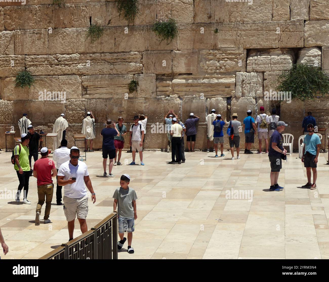 Jews pray at the Western Wall, (Wailing Wall, or Kotel), an ancient ...