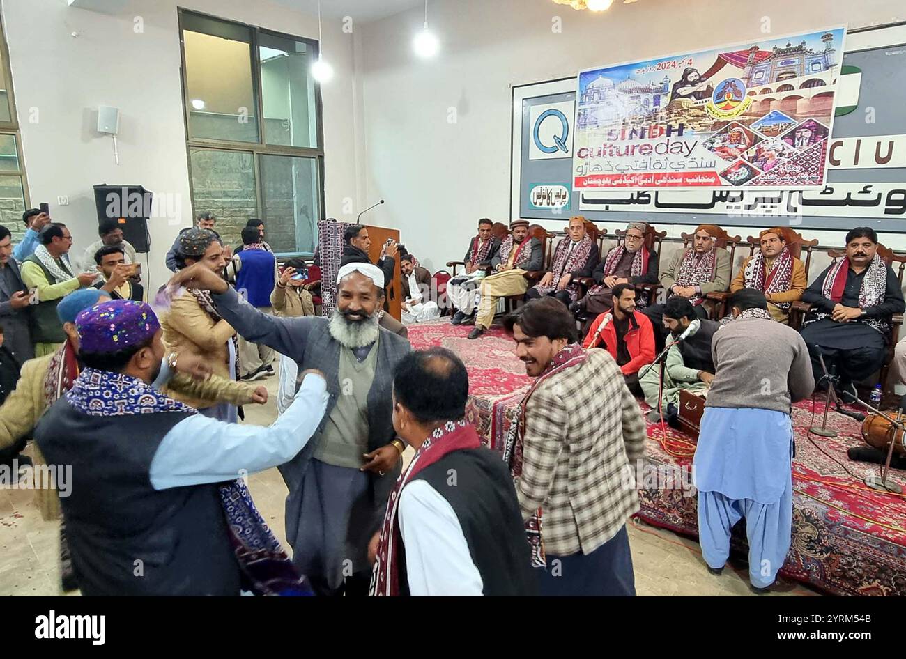 Participants are presenting traditional dance during a ceremony on the ...
