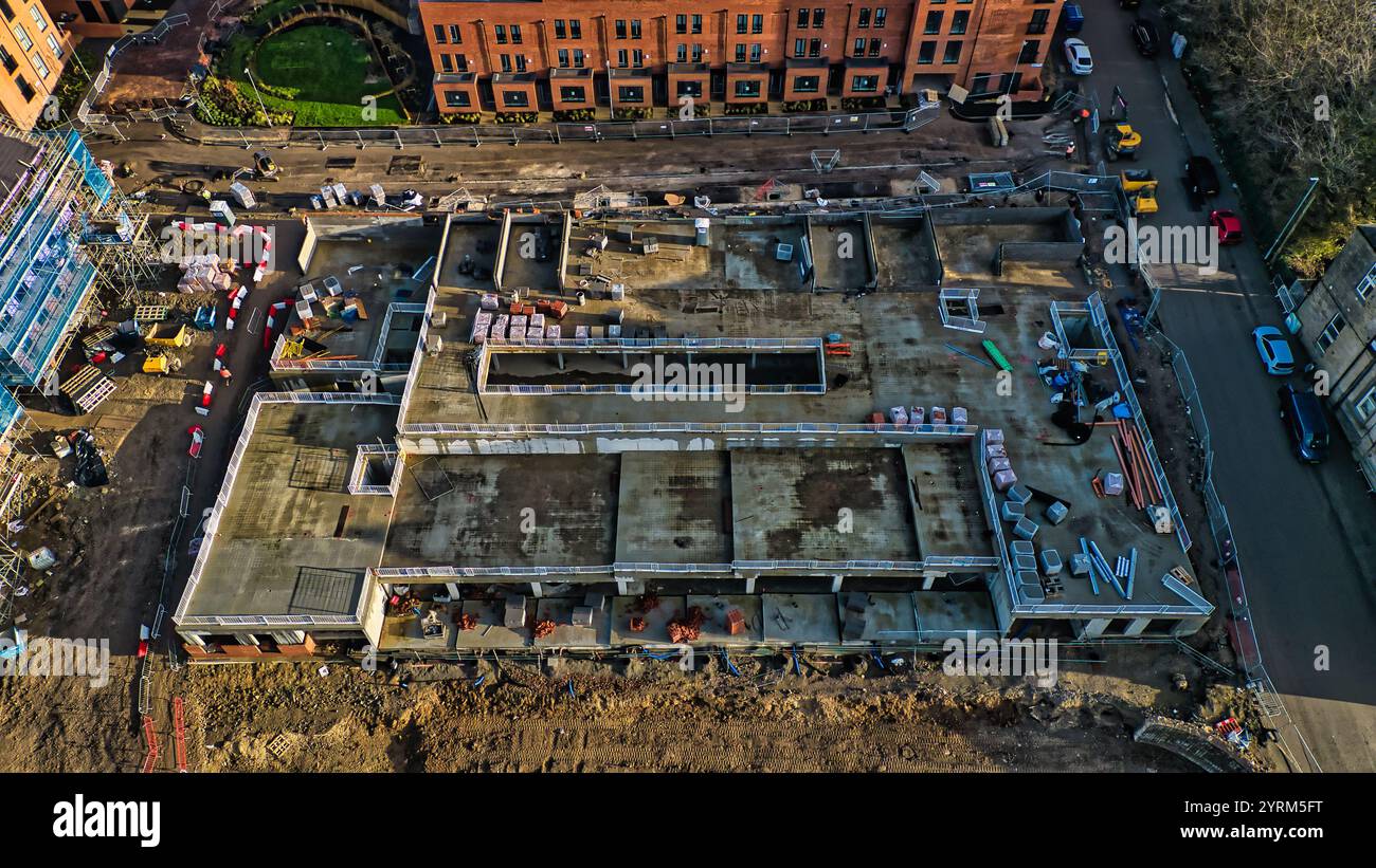 Aerial view of a construction site showing an unfinished concrete ...