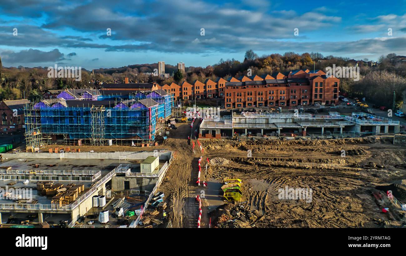Aerial view of a construction site featuring a partially completed ...