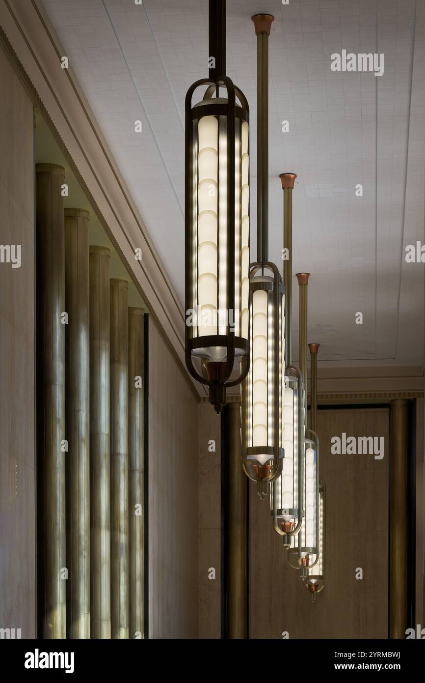 Chandeliers shaped like wheat hanging from the 40-foot ceiling of ...