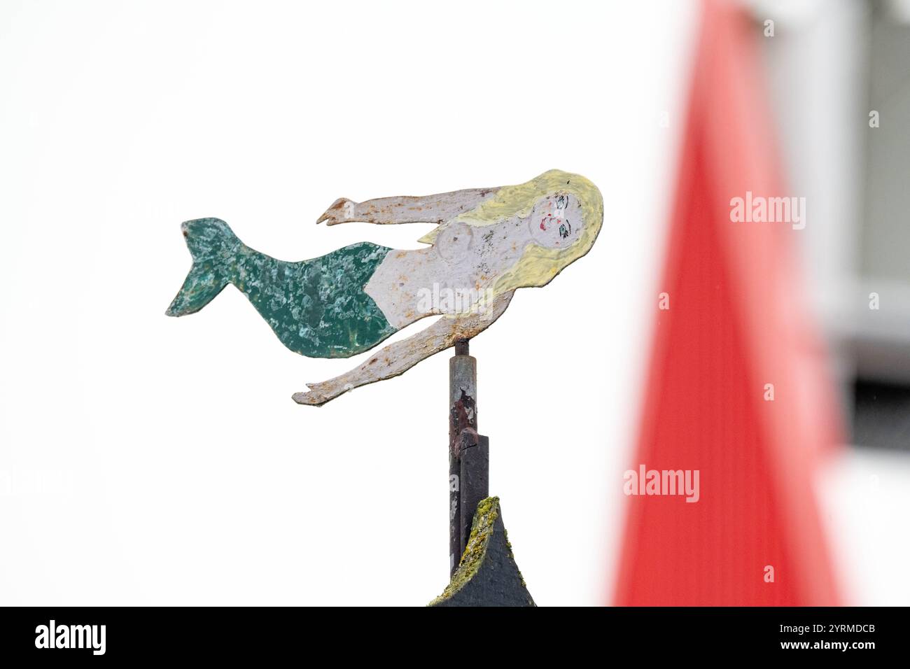 Freest, Germany. 04th Dec, 2024. A mermaid weather vane indicates the ...