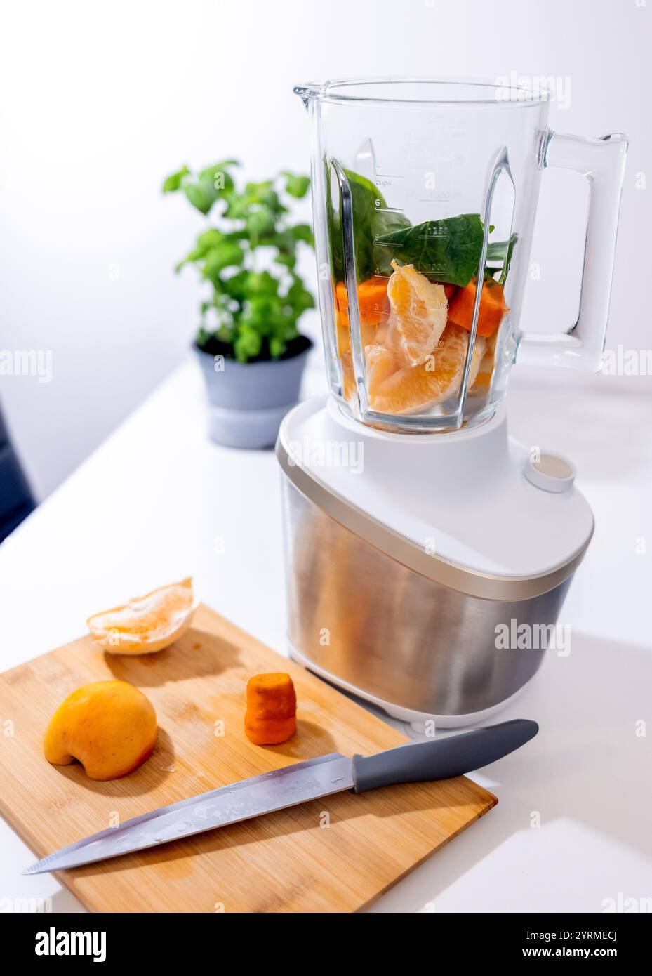 healthy eating concept, fresh vegetables and fruits in a blender, fruit ...