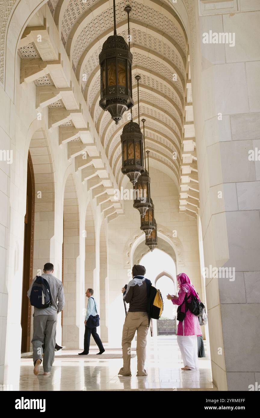 OMAN-Muscat-Al-Ghubrah: Grand Mosque-Arches and Lanterns with Visitors ...