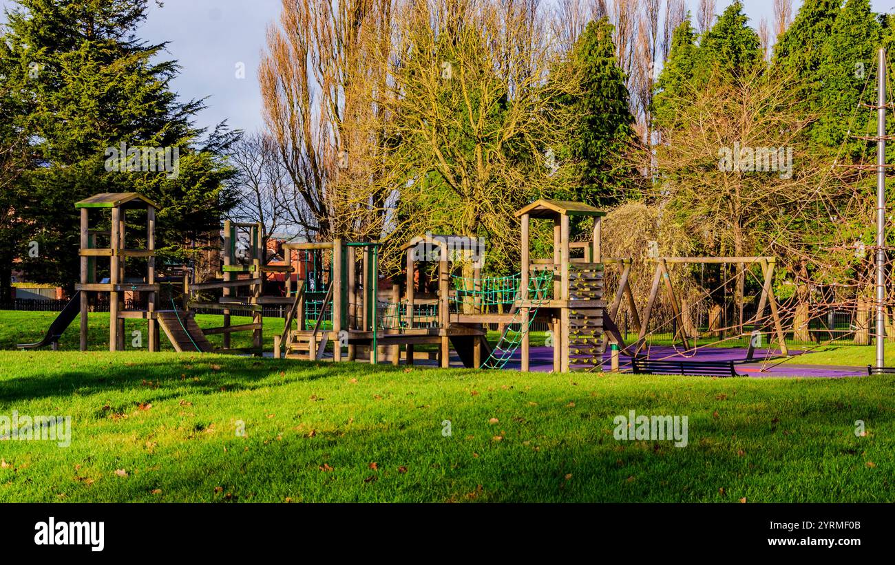 Empty children's adventure playground made of wood Stock Photo - Alamy