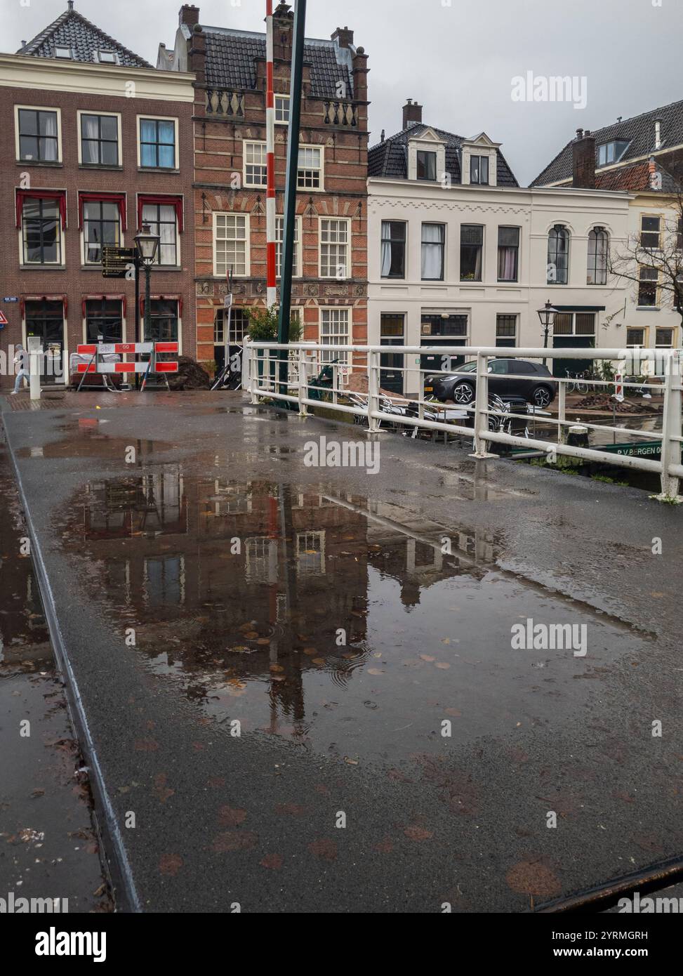 Leiden, Netherlands: A rainy day in Leiden with reflections of historic ...