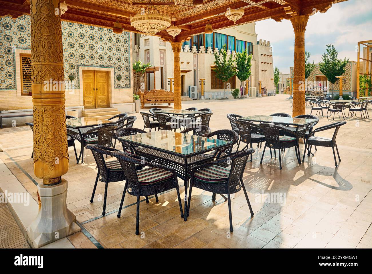 Tables and chairs at open air cafe at square in in Samarkand Eternal ...