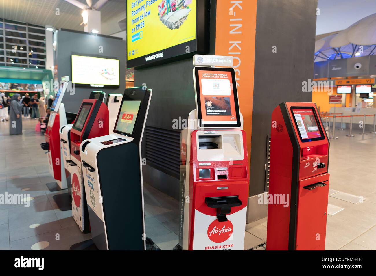 KUALA LUMPUR, MALAYSIA - NOVEMBER 27, 2023: self check-in kiosks at ...