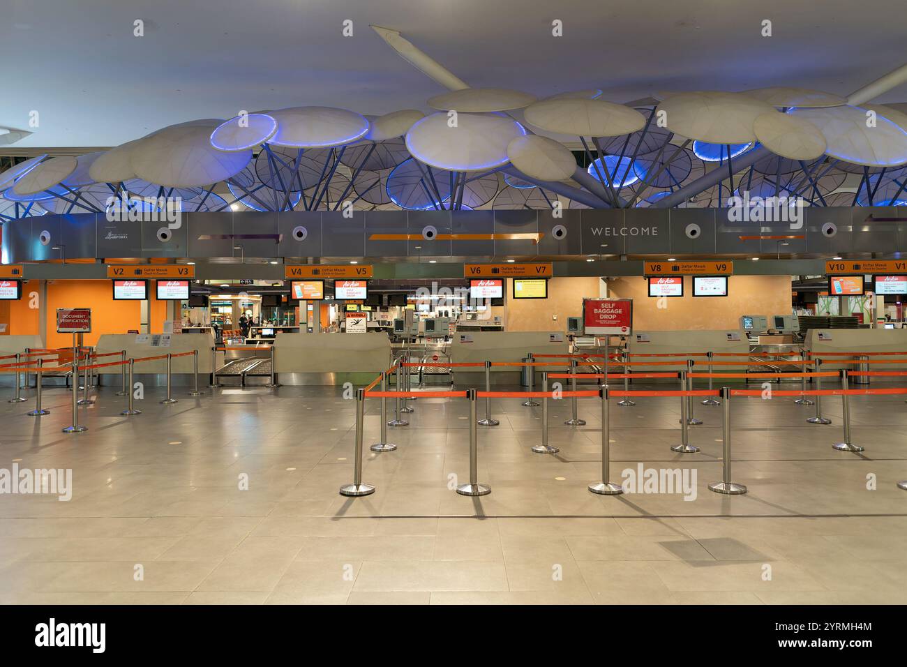 KUALA LUMPUR, MALAYSIA - NOVEMBER 27, 2023: check-in counters at KLIA2 ...